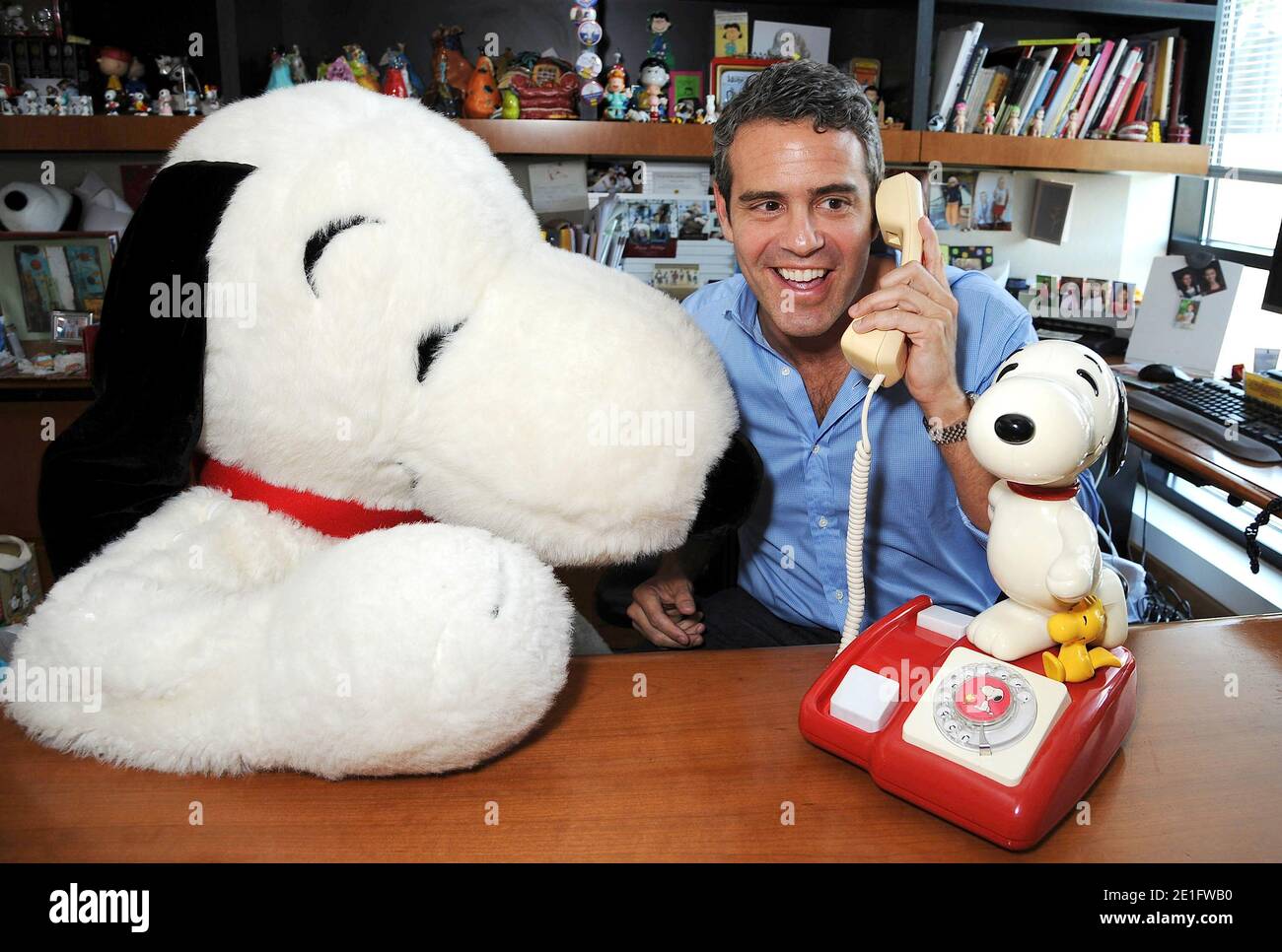 Andy Cohen and Snoopy attend the special screening of "Happiness is a ...