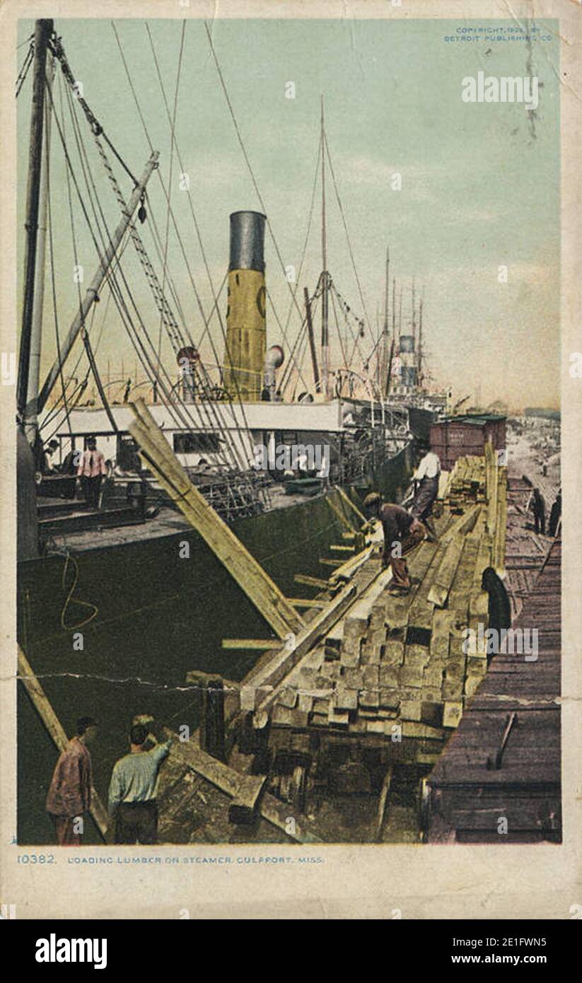 Loading Lumber on Steamer Stock Photo - Alamy