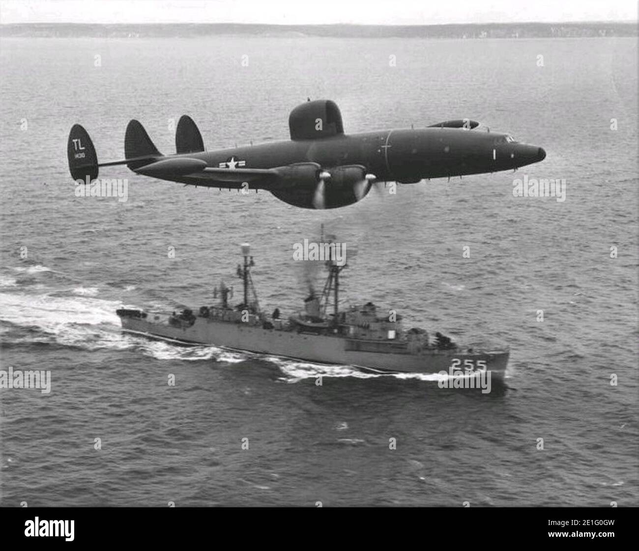 Lockheed WV-2 of VW-15 flies over USS Sellstrom (DER-255) off ...