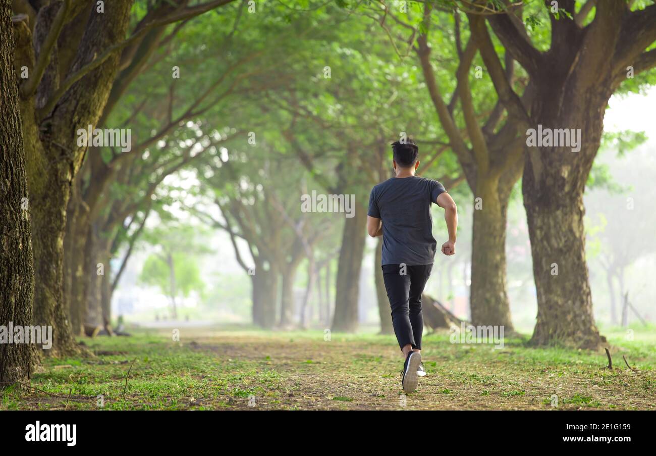 Man running rear view hi-res stock photography and images - Alamy