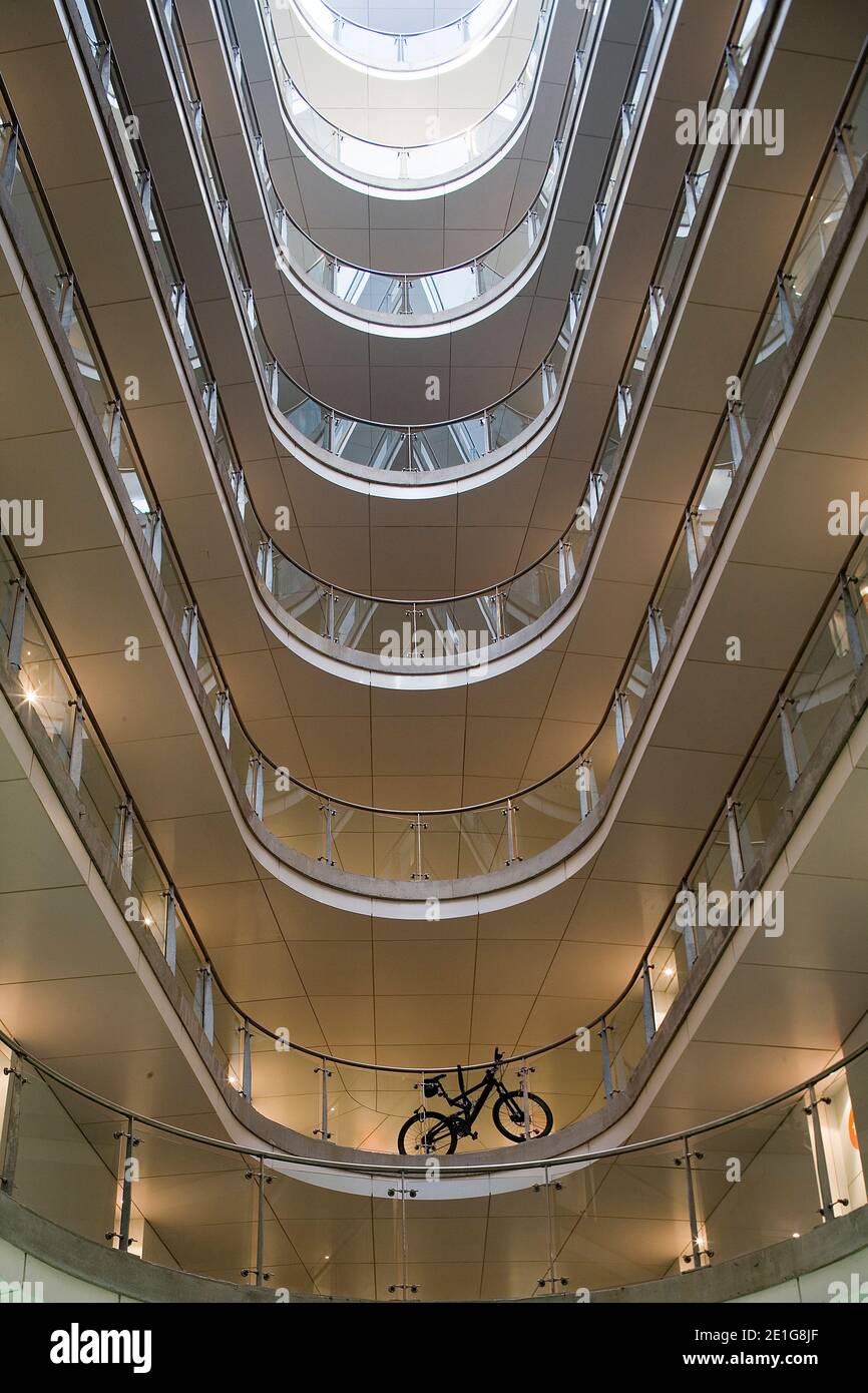 Low angle view of Atrium with bicycle, Manchester, England, UK Stock ...