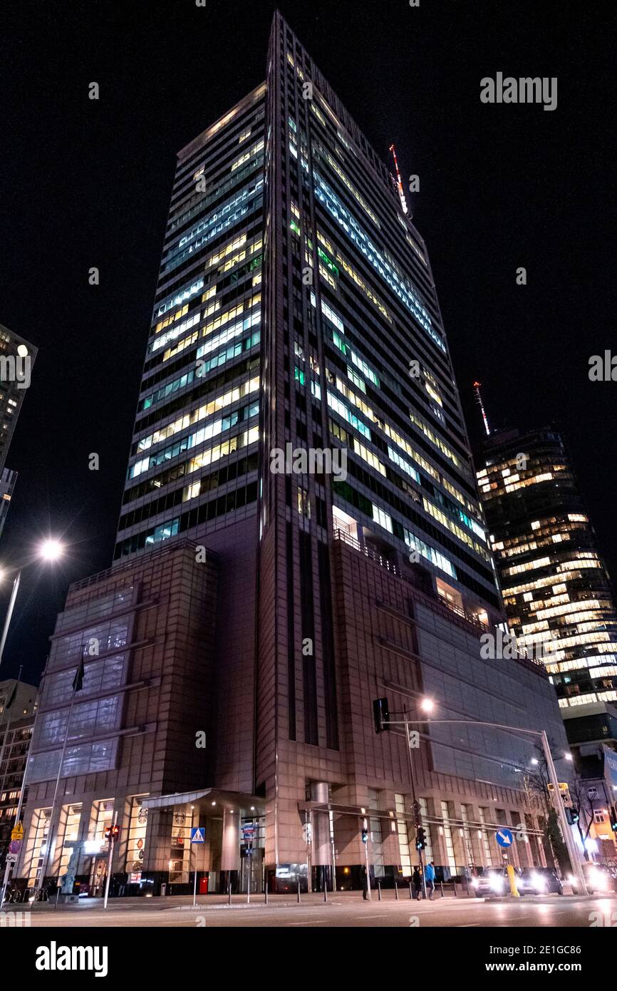 Exterior view of the Warsaw Financial Center in Warsaw, Poland at night ...