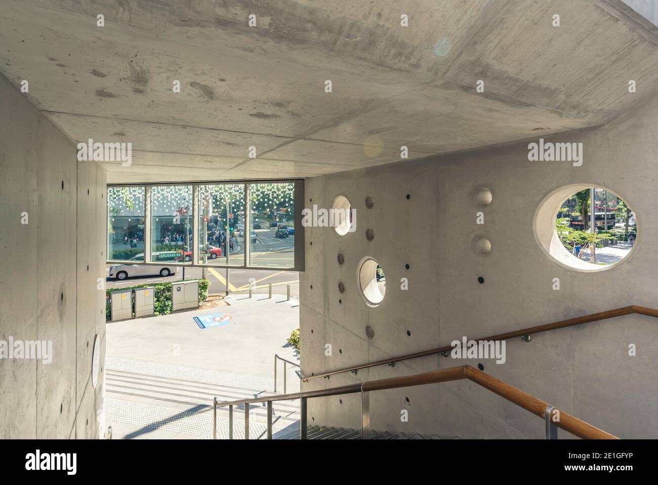 Concrete facade with round windows, Design Orchard shopping mall ...