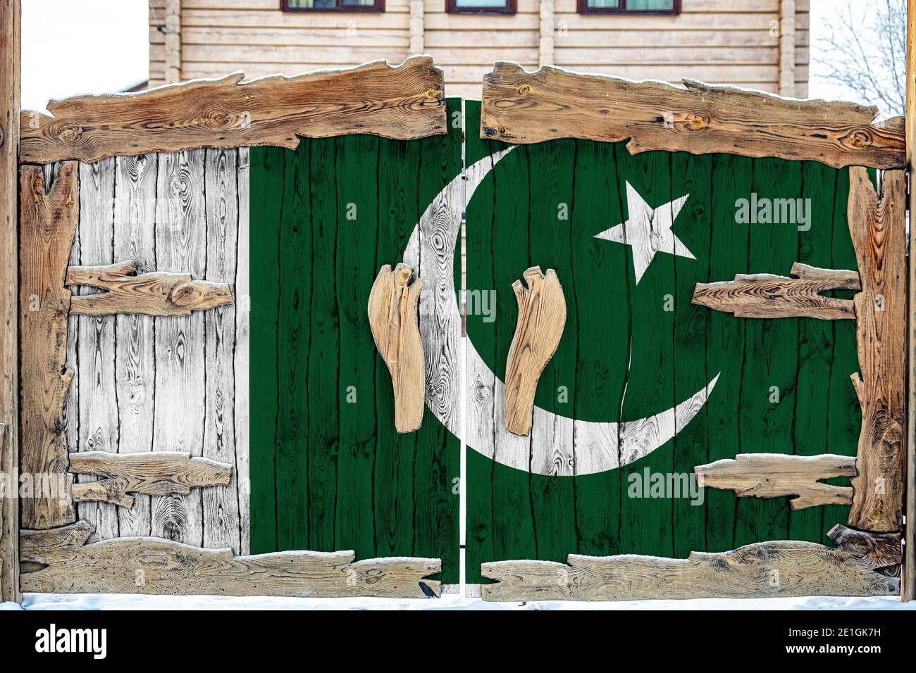 Close-up of the national flag of Pakistan on wooden gate at the ...