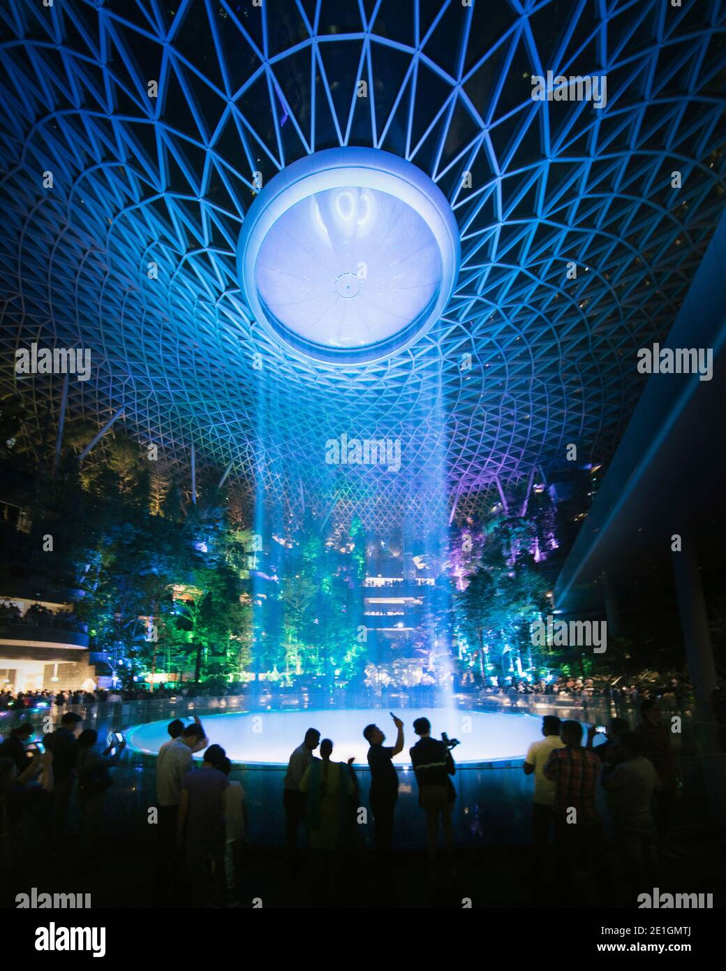 The Jewel Changi Airport in Singapore at night. A mixed use development ...