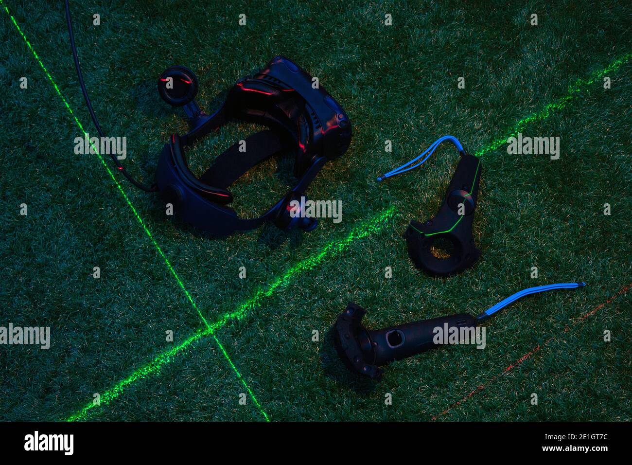 VR equipment set presented on green background goggles, scanners, two ...