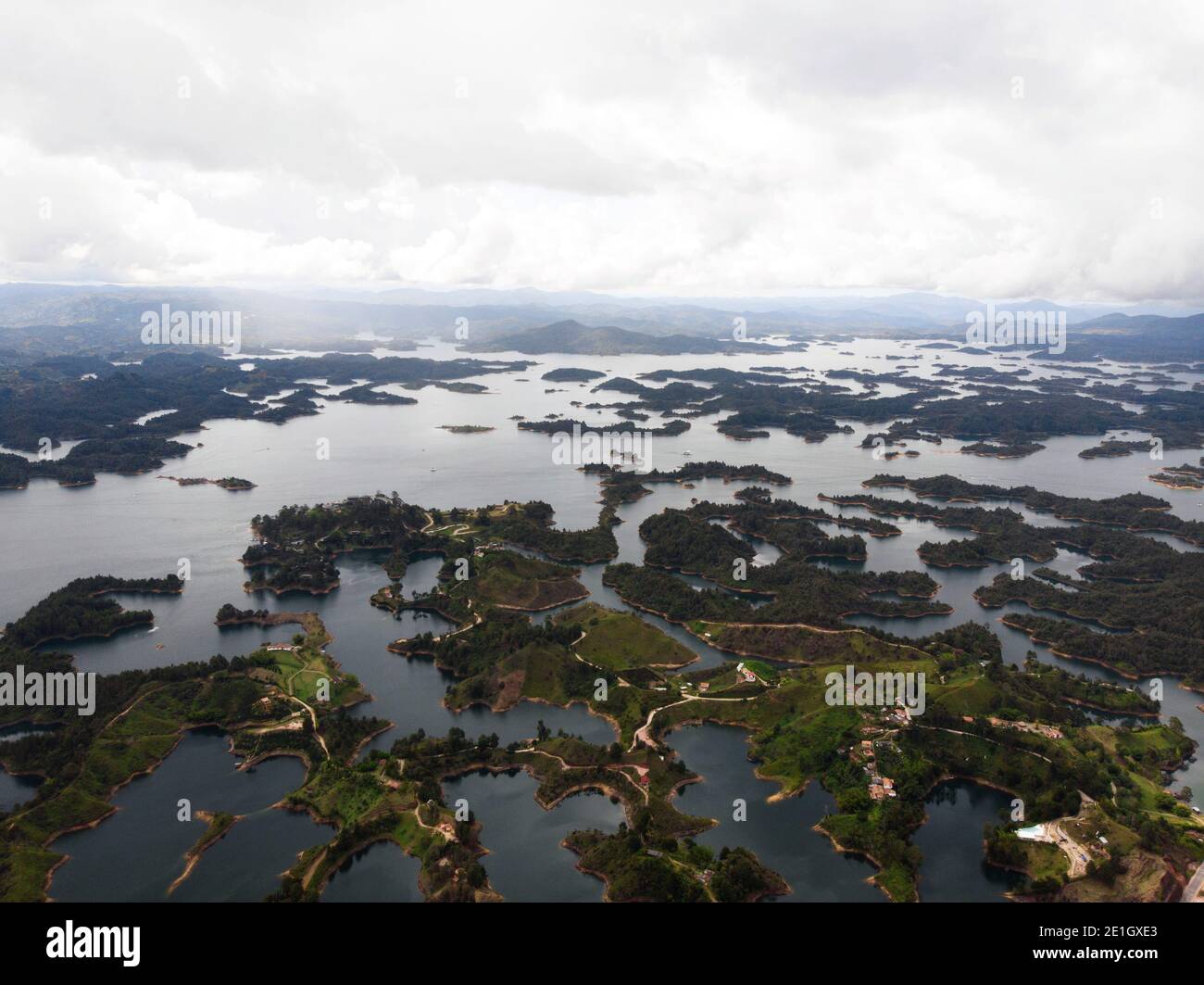Aerial panorama of artifical lake water reservoir dam Embalse Penol ...