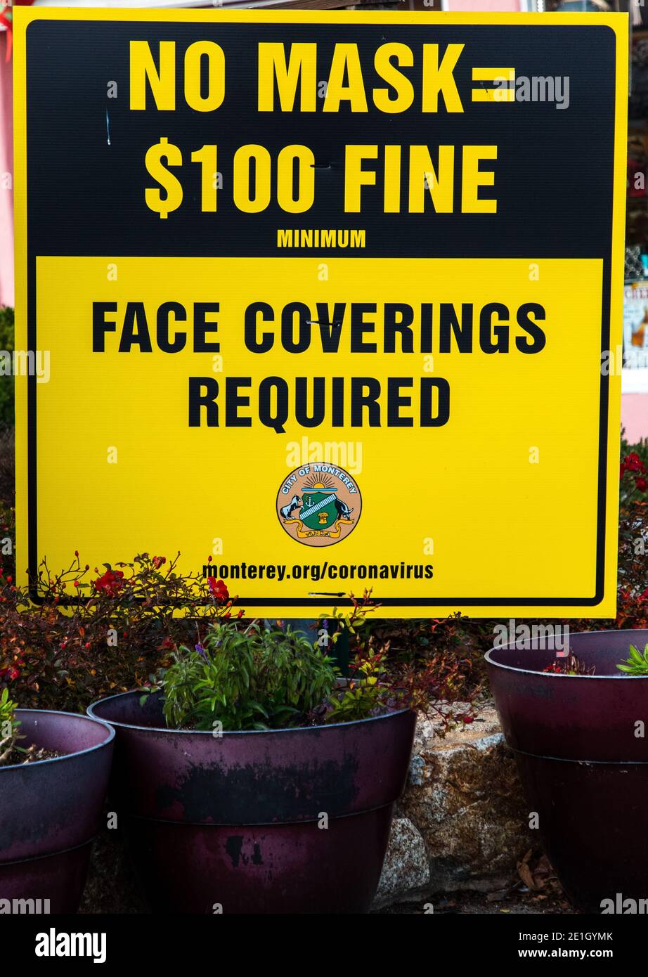 A Covid -19 Face covering required sign Stock Photo - Alamy