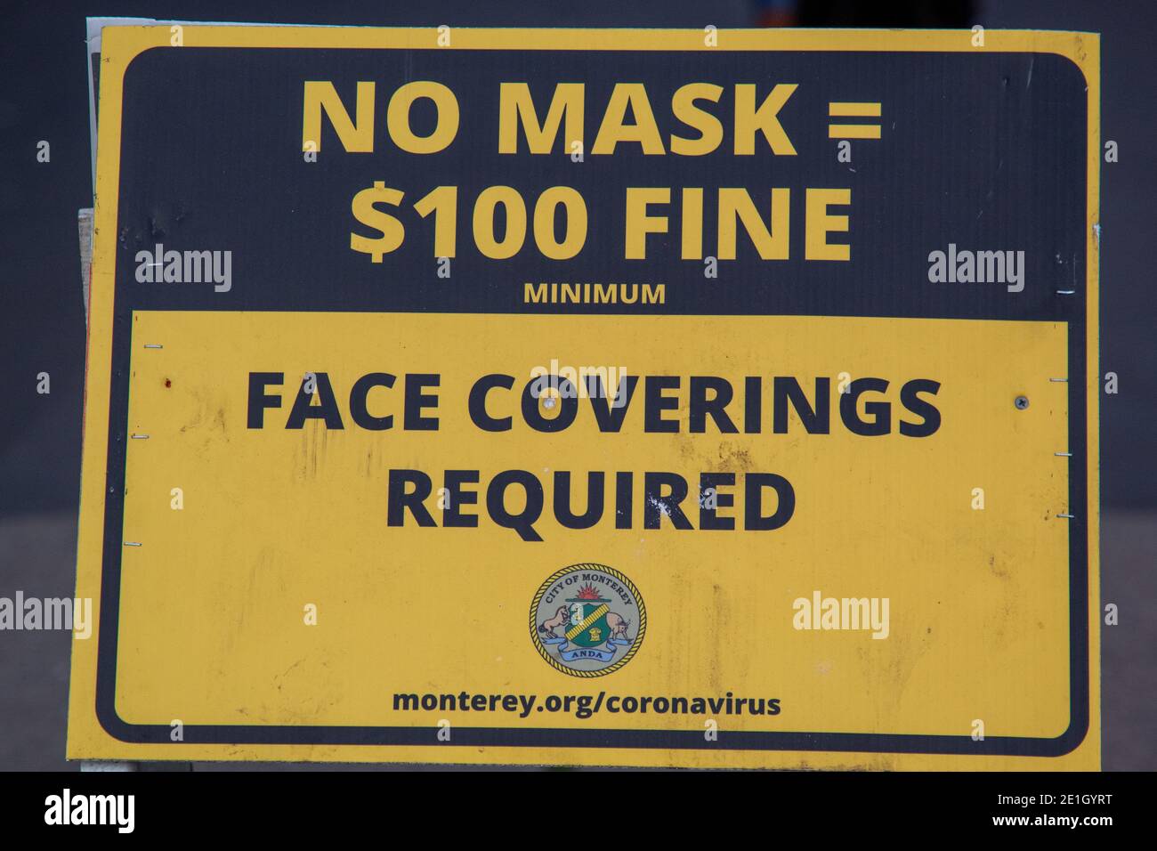 A Covid -19 Face covering required sign Stock Photo - Alamy