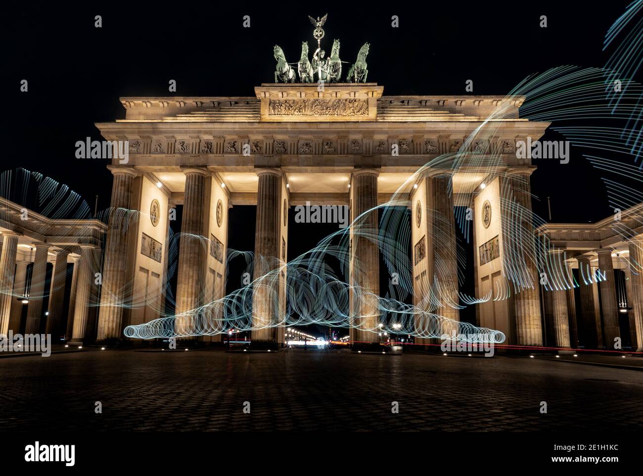 Berlin, Germany. 06th Jan, 2021. A man drew circles on Pariser Platz in ...