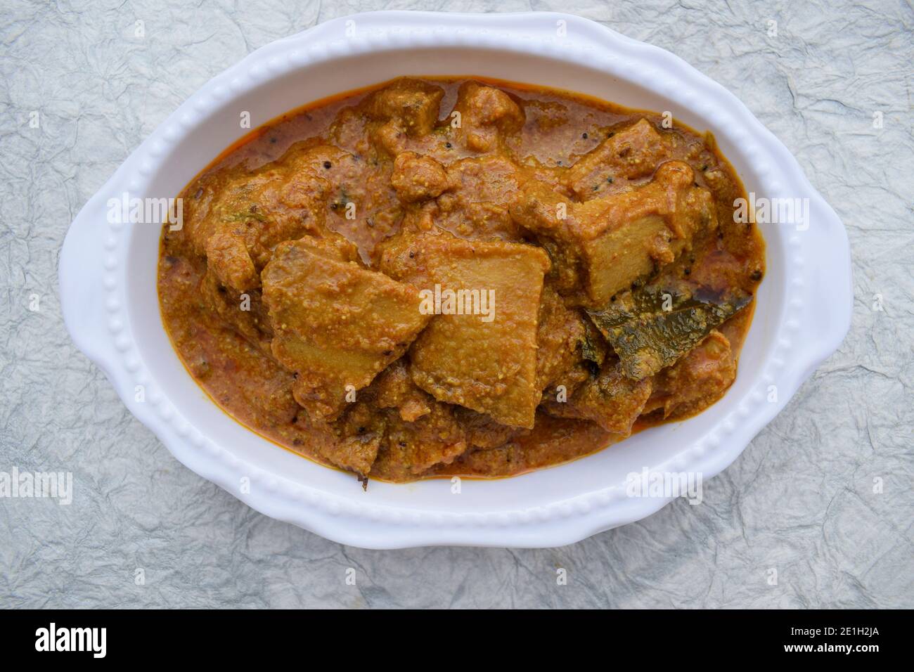 Suran ki sabzi or Jimikand masala curry closeup. Delicious exotic gravy ...