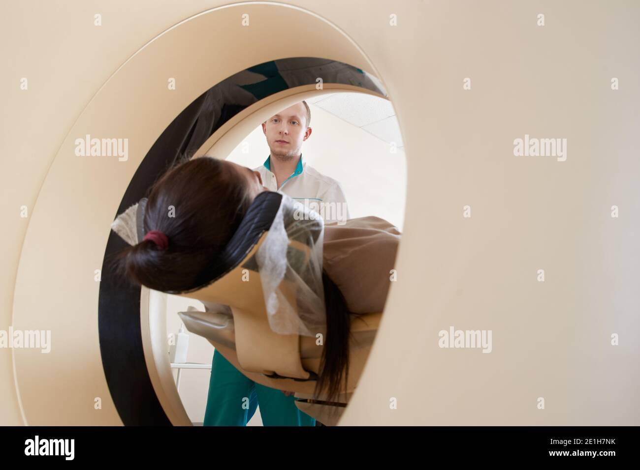 Female patient undergoing MRI - Magnetic resonance imaging in Hospital ...