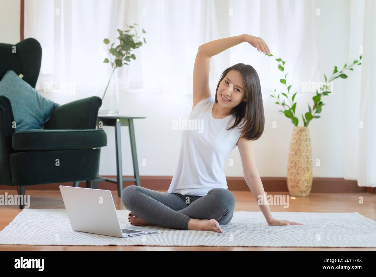Beautiful asian woman staying fit by exercising at home for healthy trend lifestyle Stock Photo ...