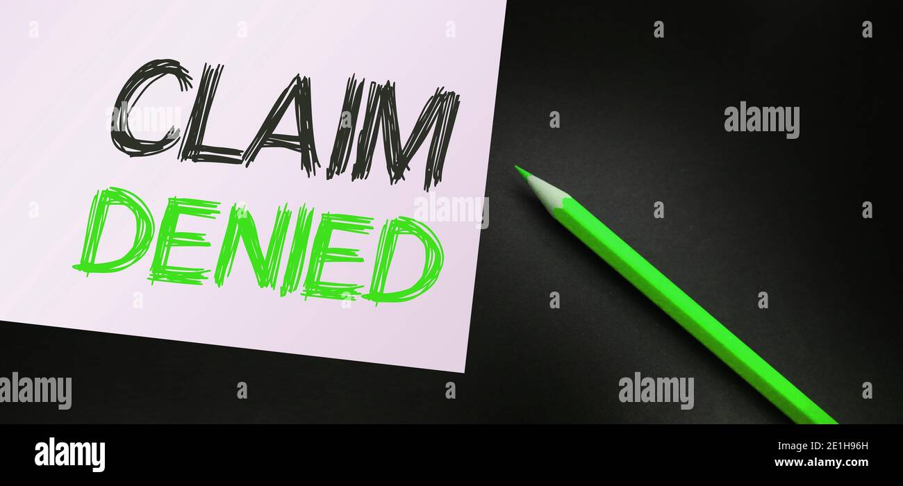 Claim denied words and orange pencil besides. Application rejected ...