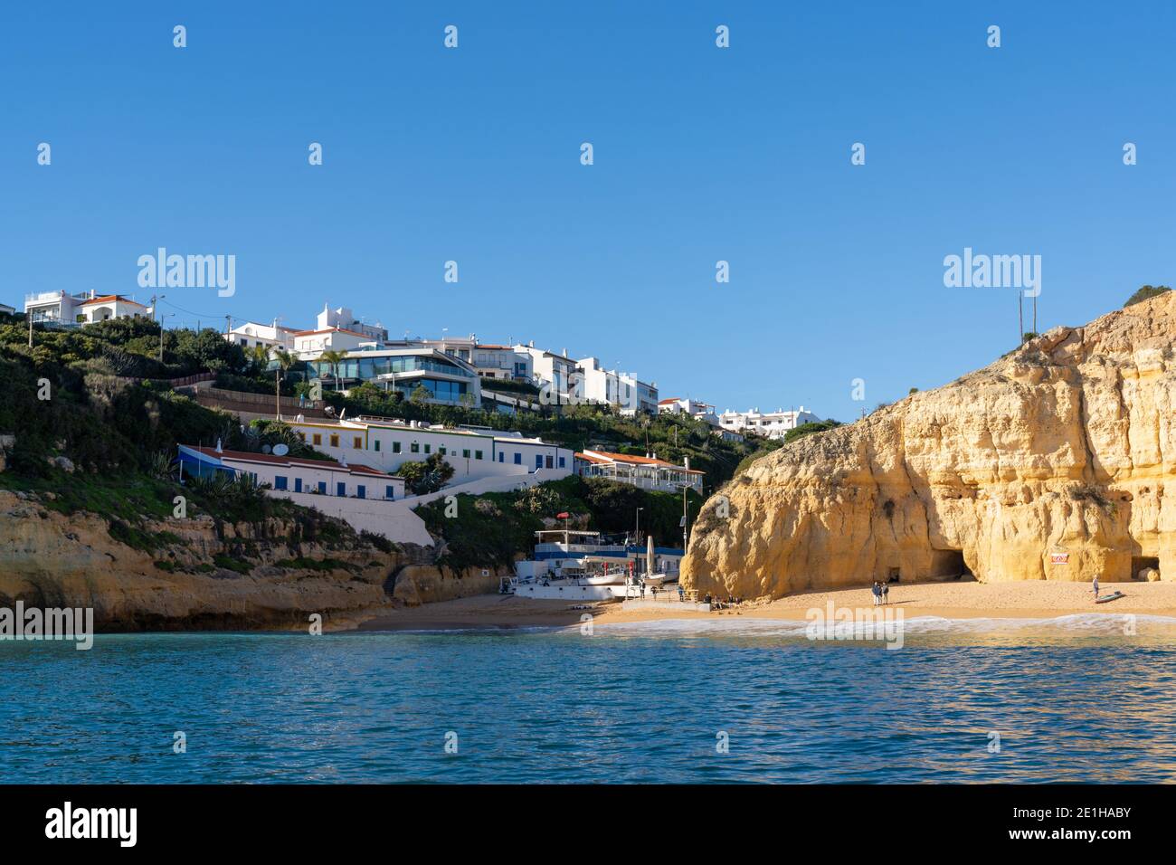 the beach town of Benagil on the Algarve coast of Portugal Stock Photo ...