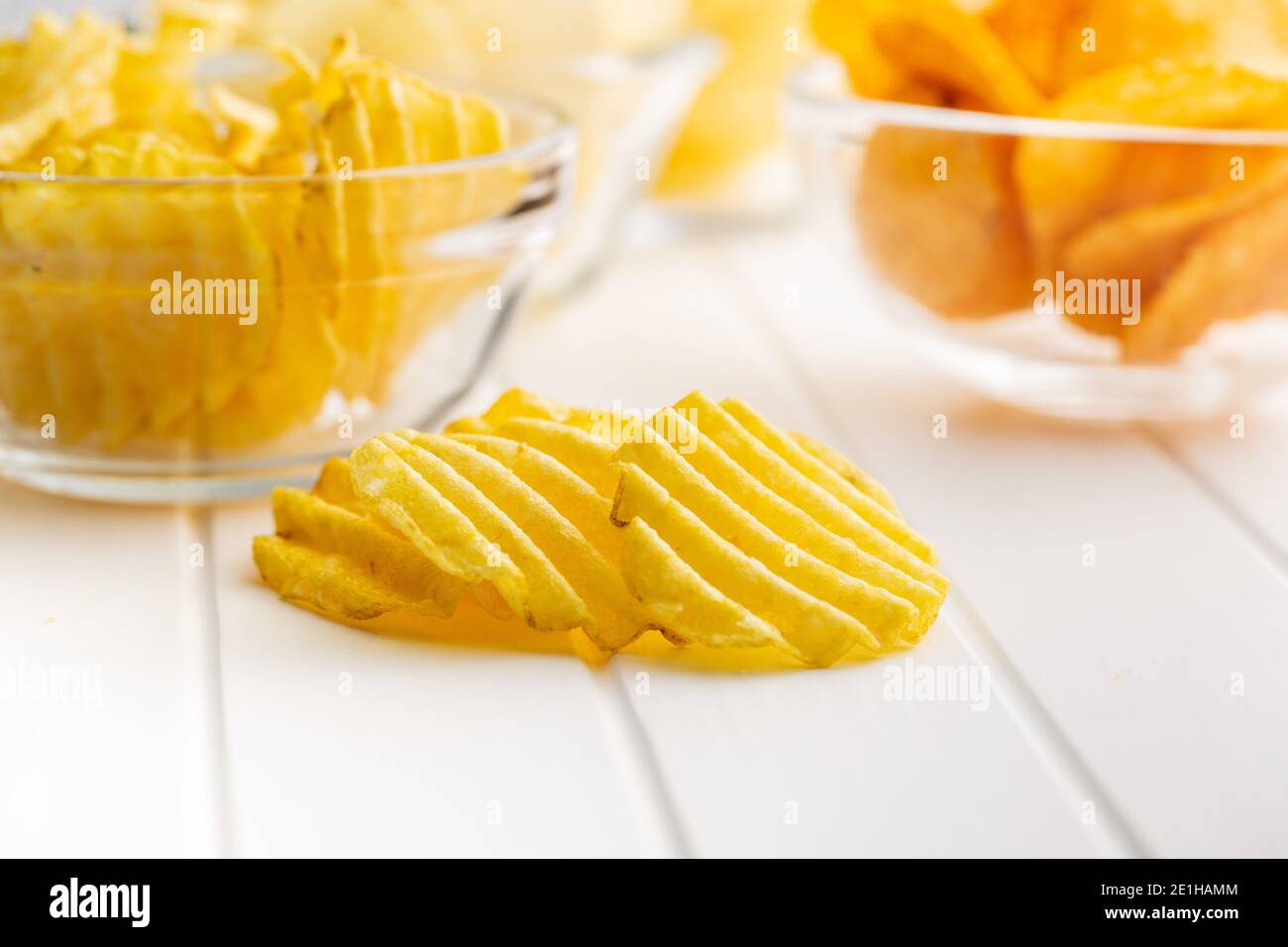 Crispy potato chips on white hi-res stock photography and images - Alamy