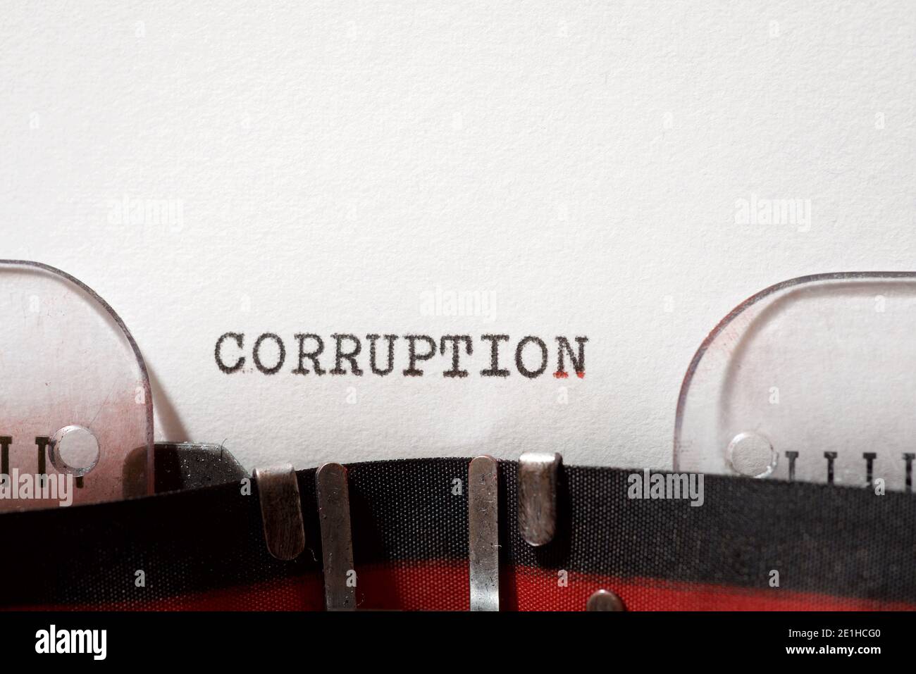 Corruption word written with a typewriter Stock Photo - Alamy
