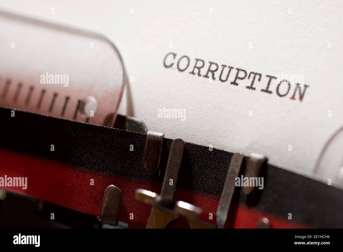 Corruption word written with a typewriter Stock Photo - Alamy