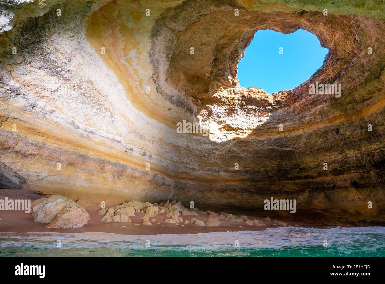 A view of the inside of the Benagil Cave on the Algarve coast of ...