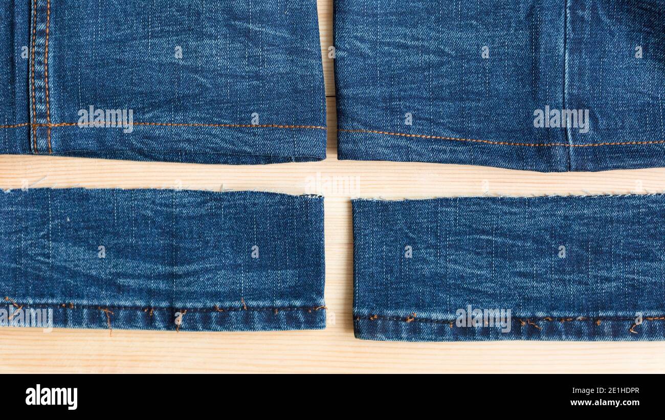 Hemmed trouser legs and cut pieces of fabric Stock Photo - Alamy