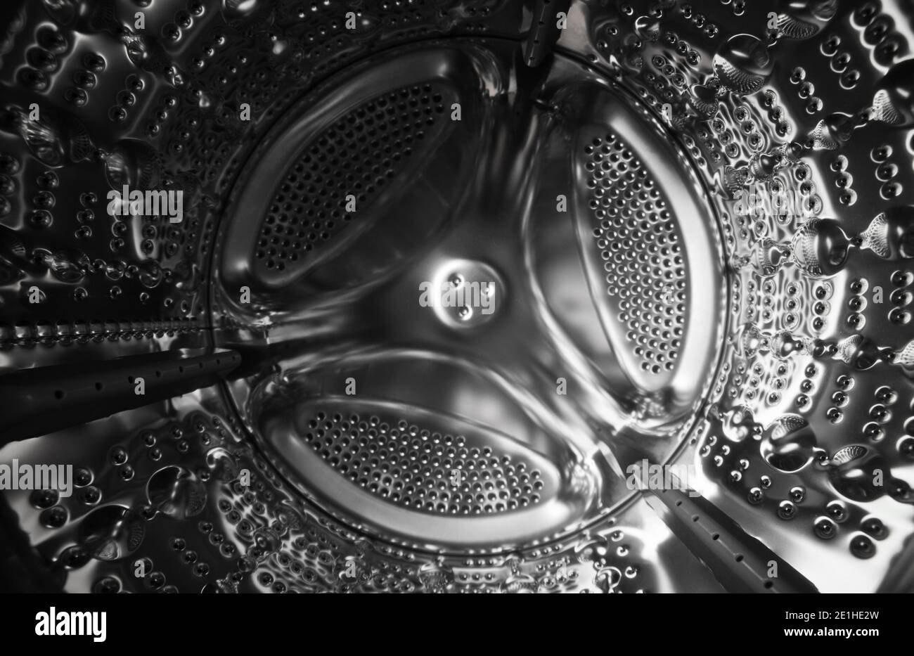 Metal drum washing machine close-up. Wide angle photo Stock Photo - Alamy