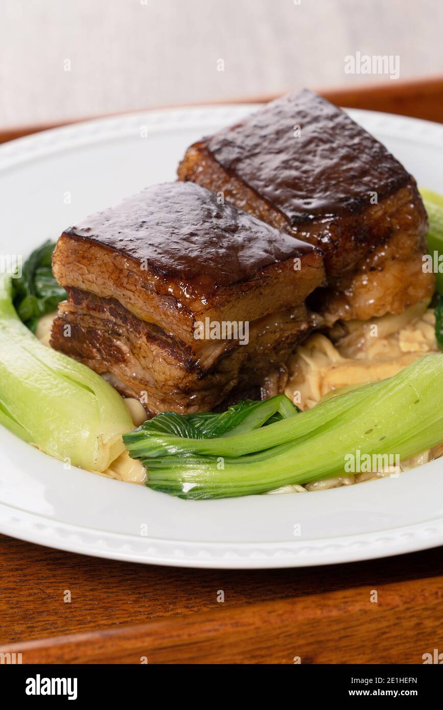 Dong Po Rou (Dongpo pork meat) in a beautiful white plate with green ...