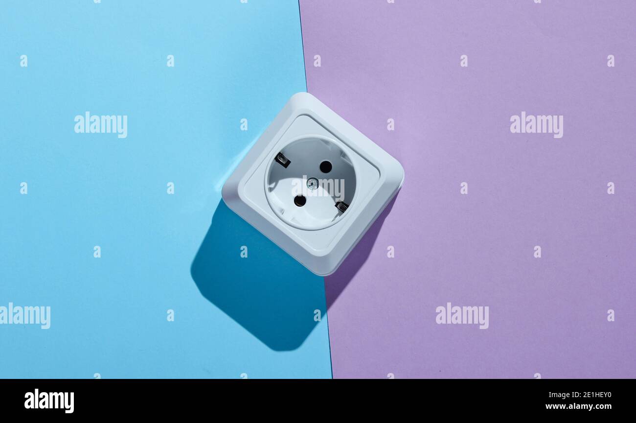 White plastic power socket on pastel background. Minimalism Stock Photo ...