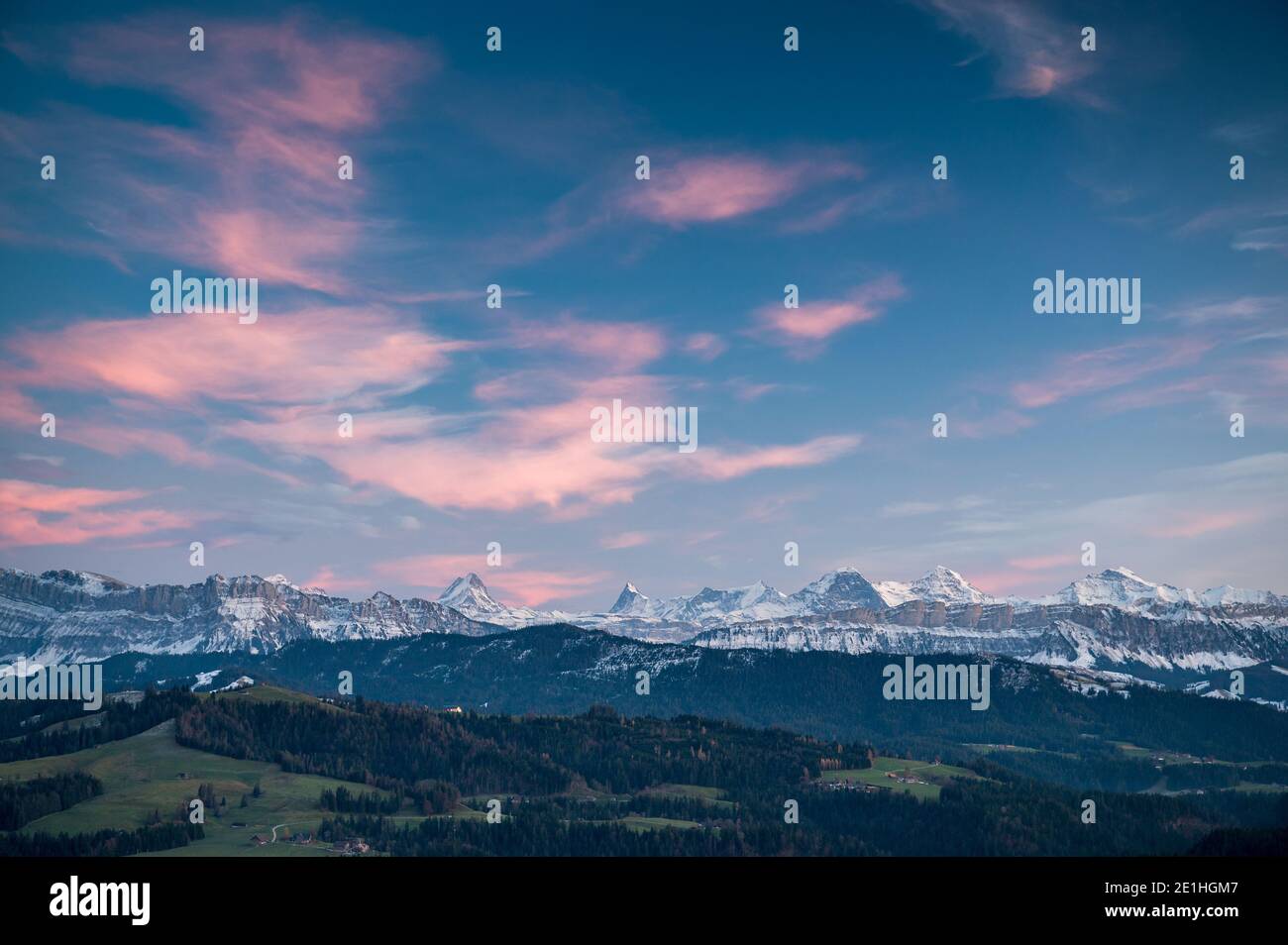 Bernese Alps at blue hour with the hills of Emmental in front Stock ...