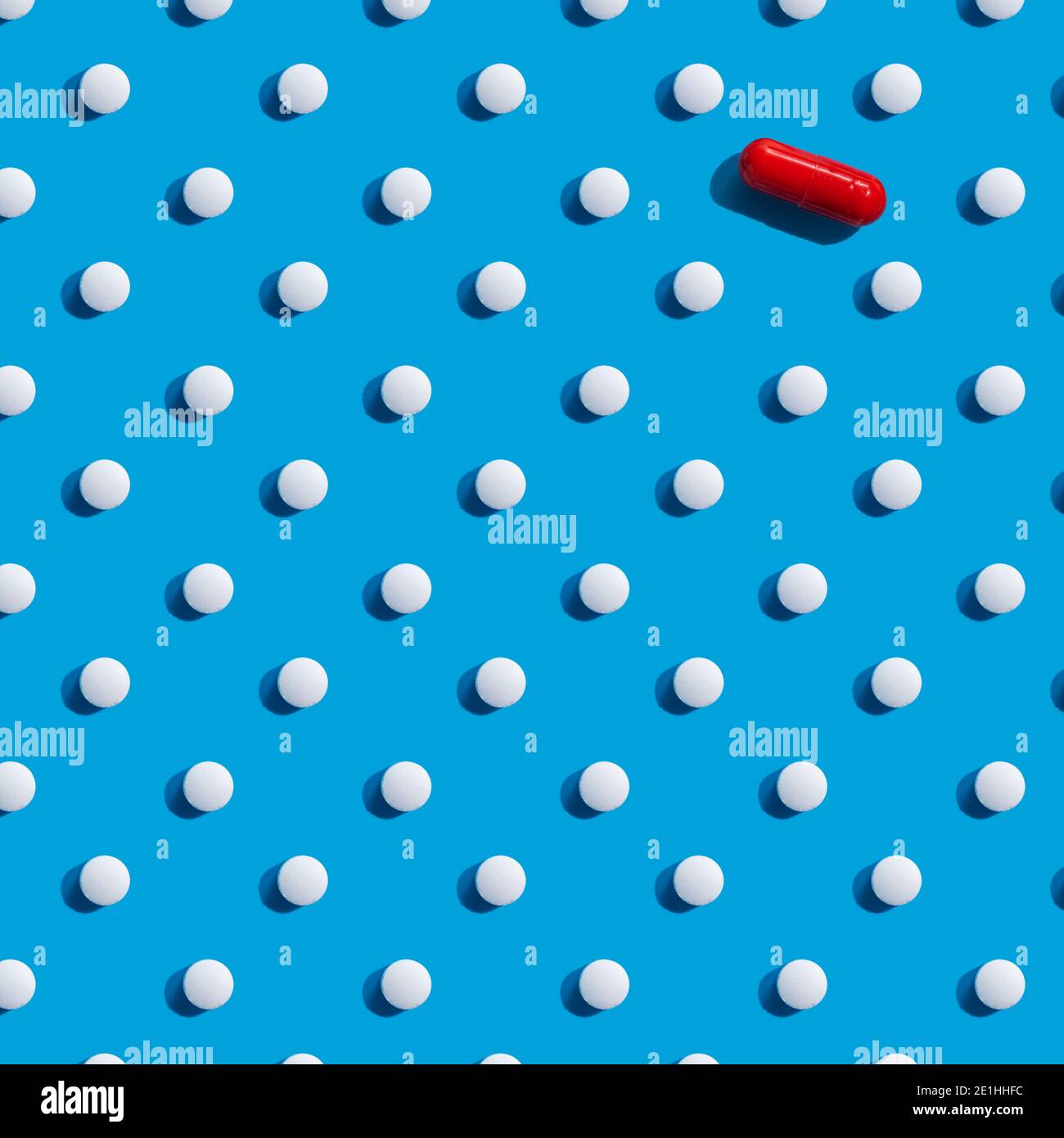 tablets and red pill. seamless pattern on blue background. medicine ...