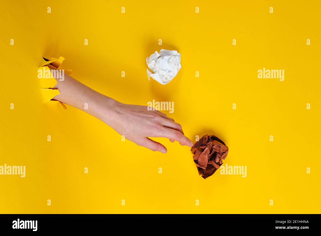 Hand crumpling hi-res stock photography and images - Alamy