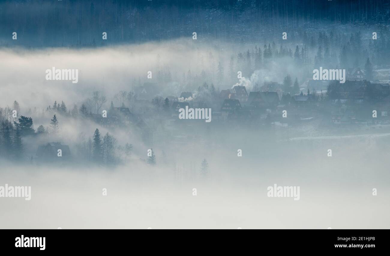 village in Poland drowning in smog from coal-fired stoves Stock Photo ...