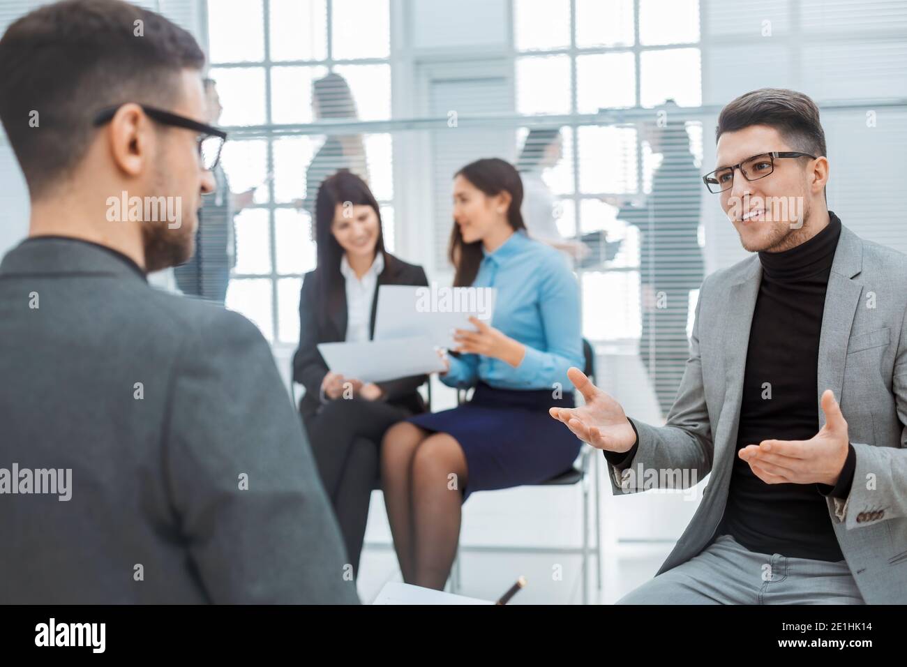 Office manager speaking employees hi-res stock photography and images ...