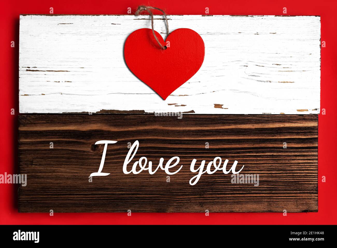 red heart on white and brown wooden and red background with text I love ...