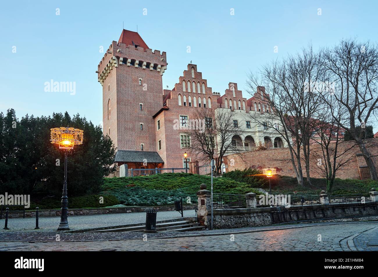 red brick tower reconstructed royal castle in the evening in Poznan ...
