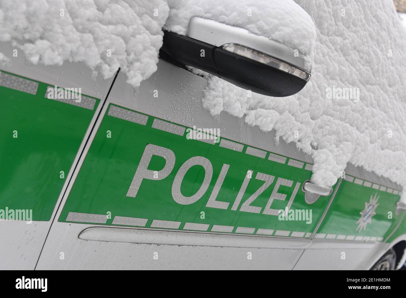 Munich, Deutschland. 06th Jan, 2021. snowed in police car in Munich on ...