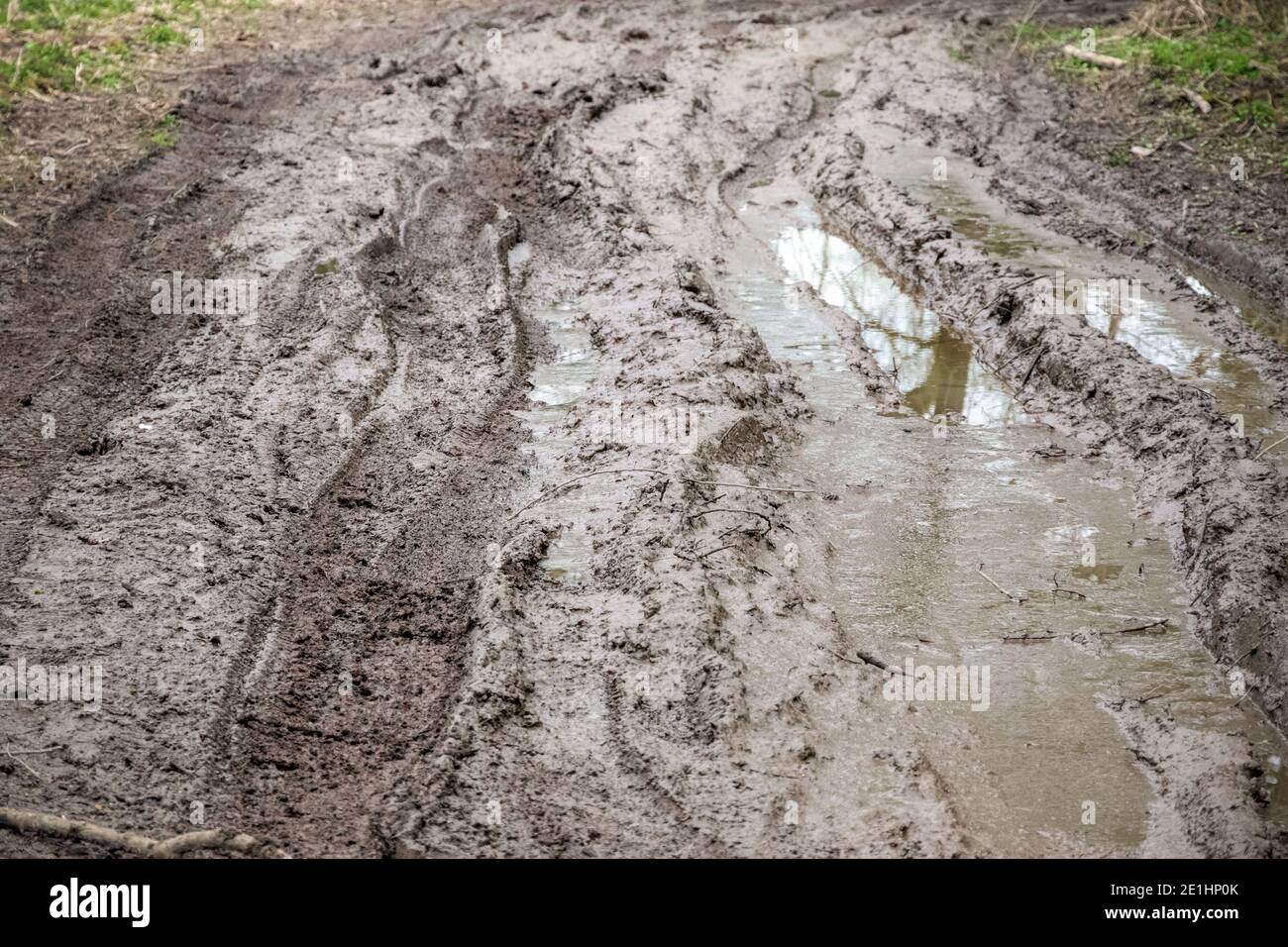 Muddy puddle road after rain hi-res stock photography and images - Alamy