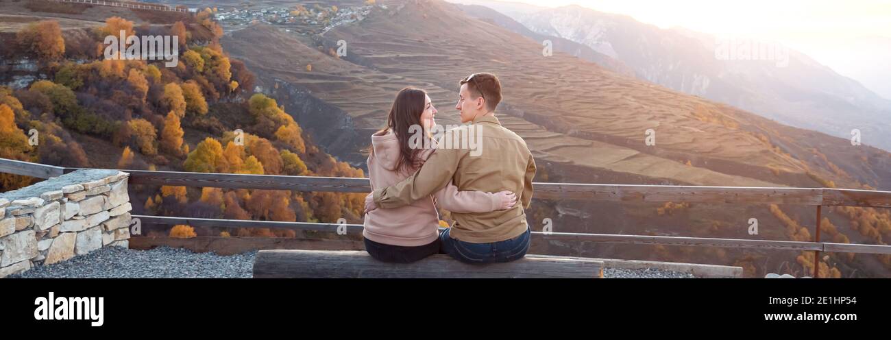 Couple landscape sitting backside hi-res stock photography and images ...