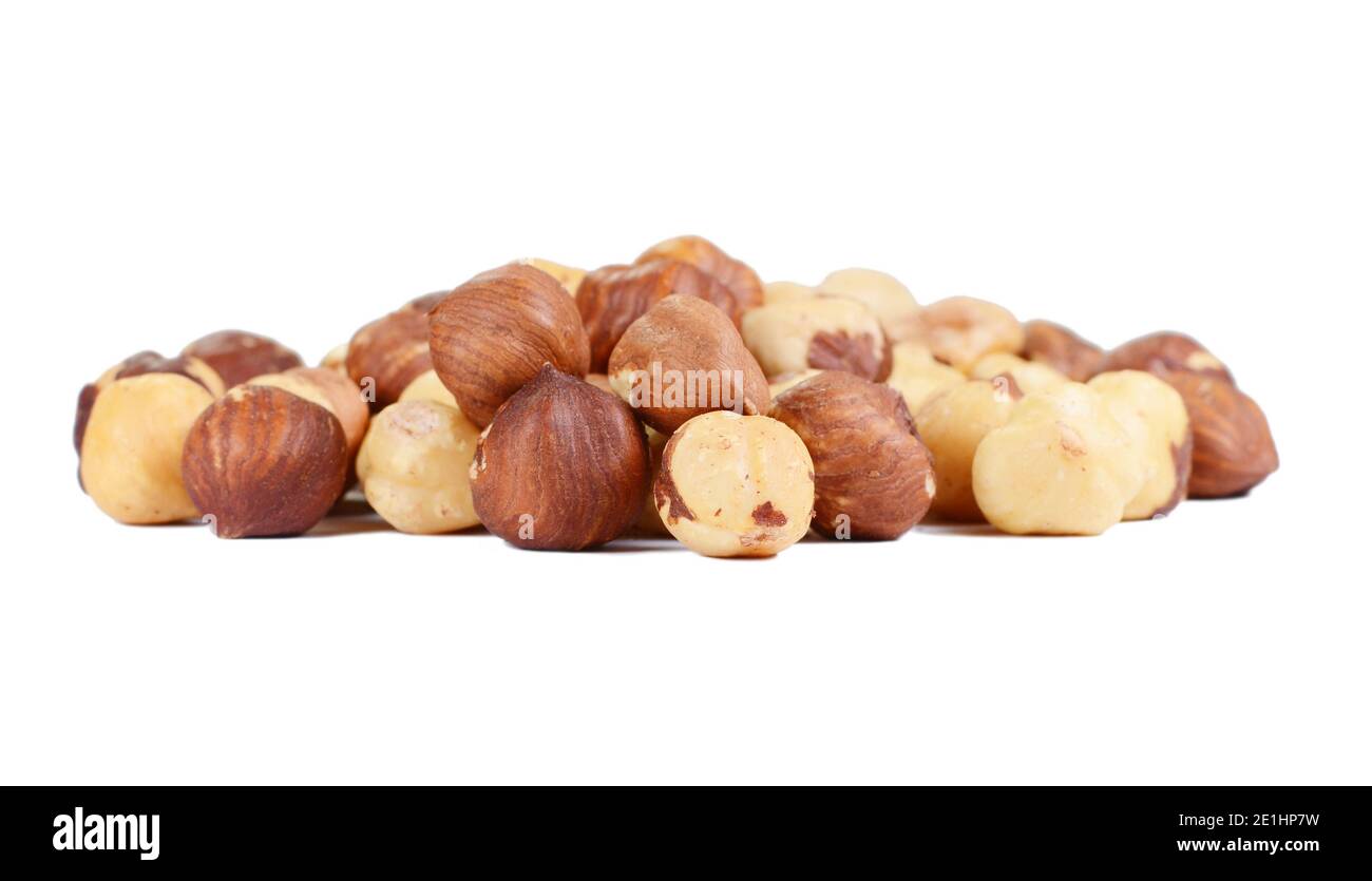 Heap of hazelnuts isolated on white background Stock Photo - Alamy
