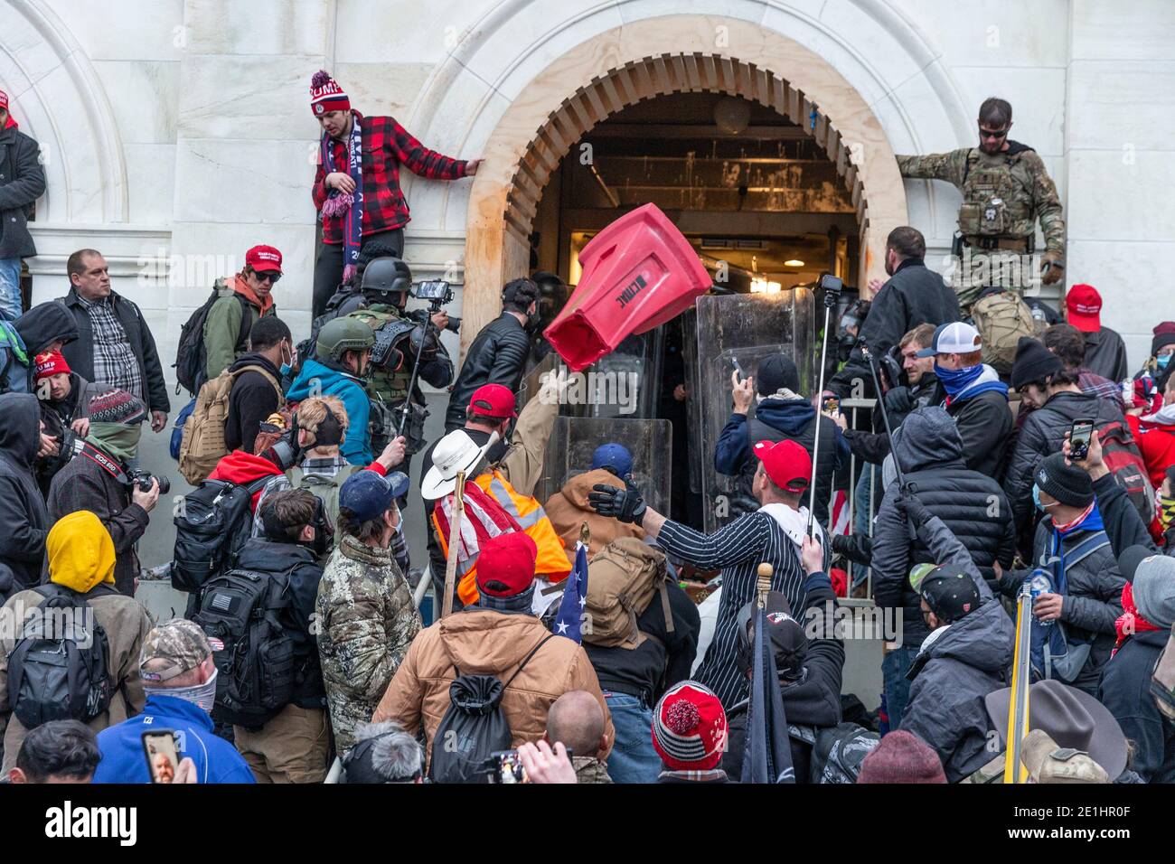 Washington, DC - January 6, 2021: Rioters clash with police trying to ...