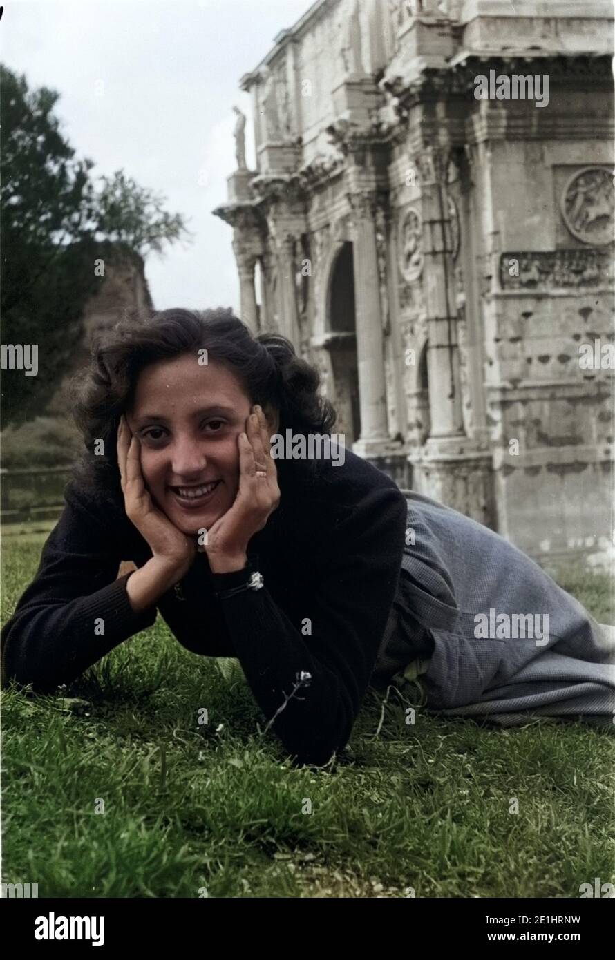 Travel to Rome - Italy in 1950s - Relaxed young woman on a meadow near ...
