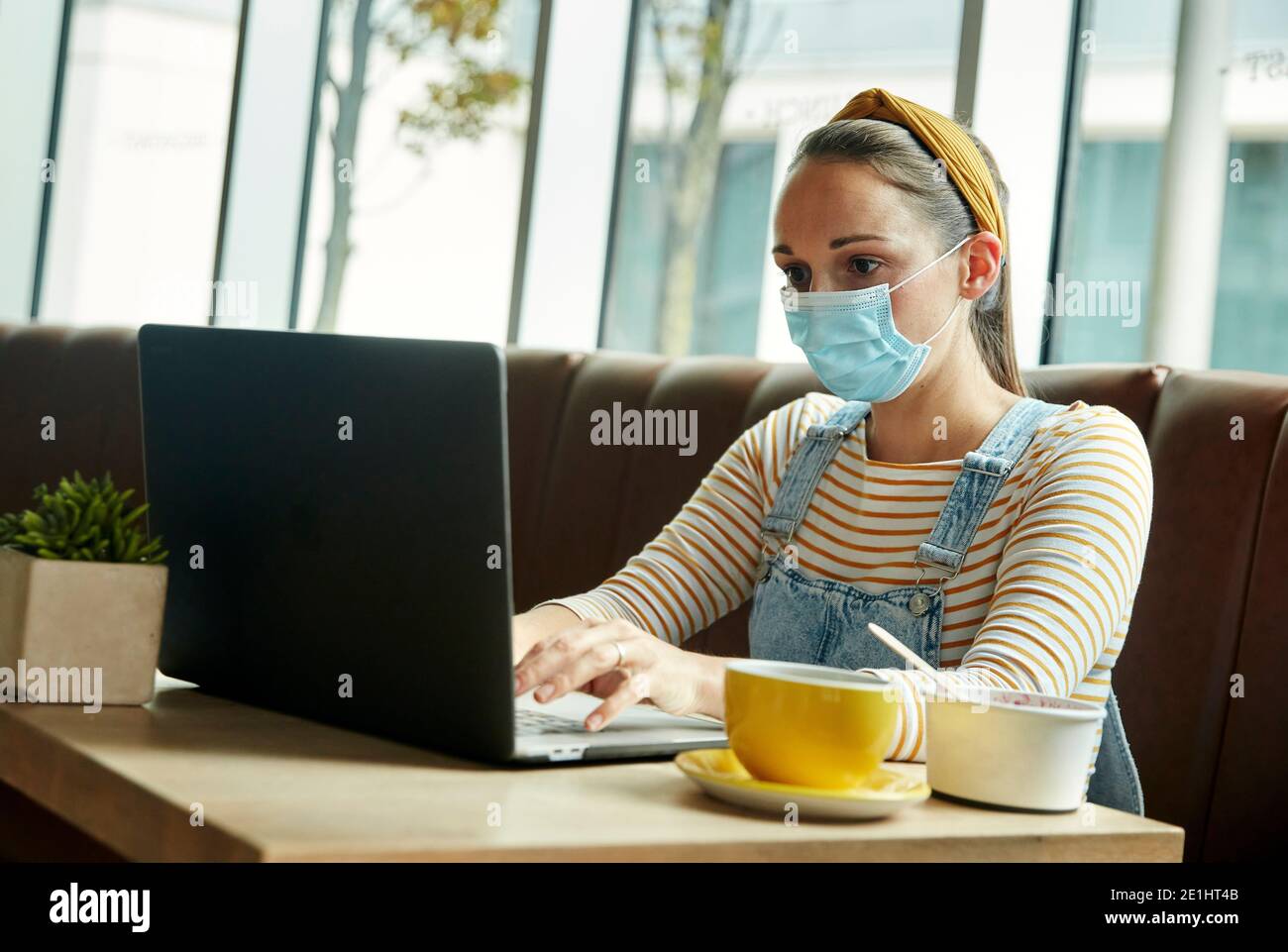 Women using face mask hi-res stock photography and images - Alamy