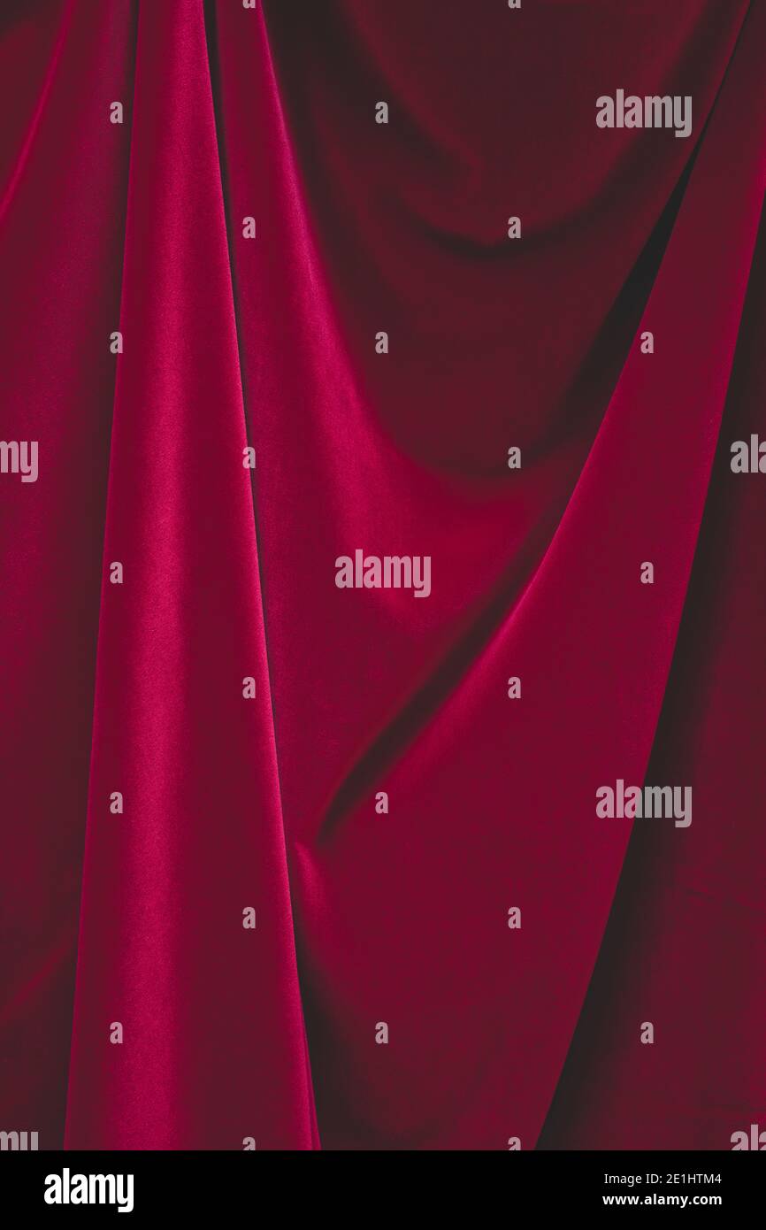 Detail of draped red velvet curtain with folds and creases Stock Photo ...