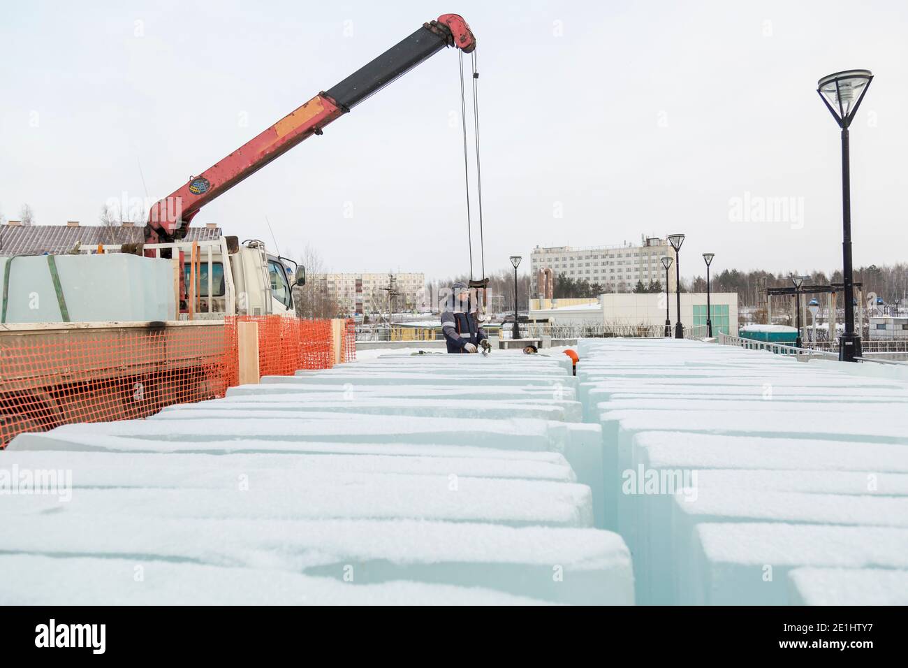 Portrait of a hydraulic crane operator loading ice panels Stock Photo ...