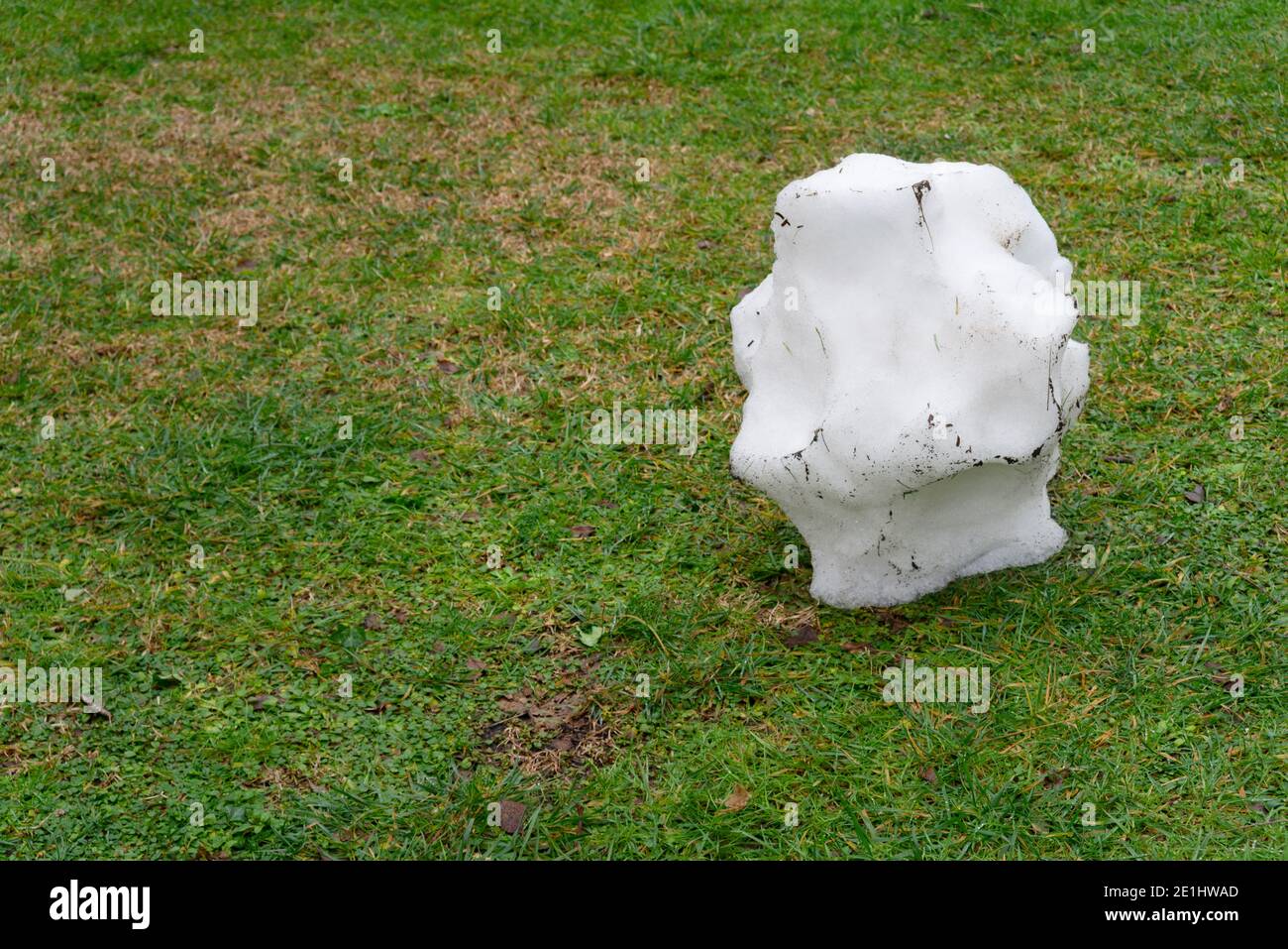 Patch of Snow with Grass Stock Photo - Alamy