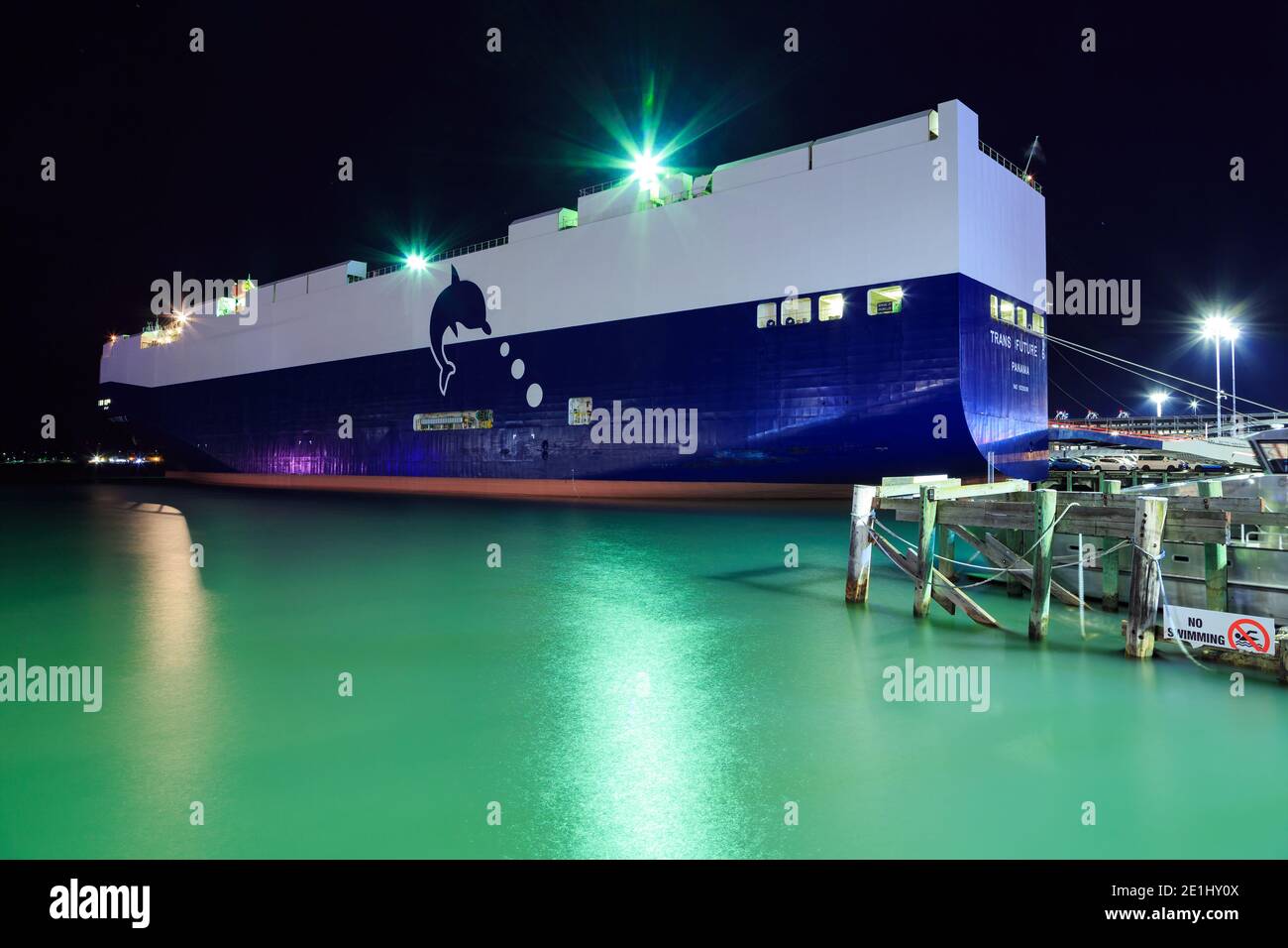 A giant vehicles carrier ship, the Trans Future 6, unloading cars at ...