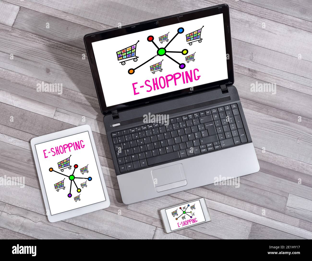 E-shopping concept shown on different information technology devices ...
