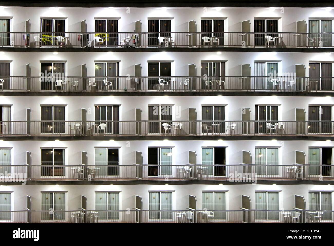 Balconies of modern hotel at night Stock Photo - Alamy
