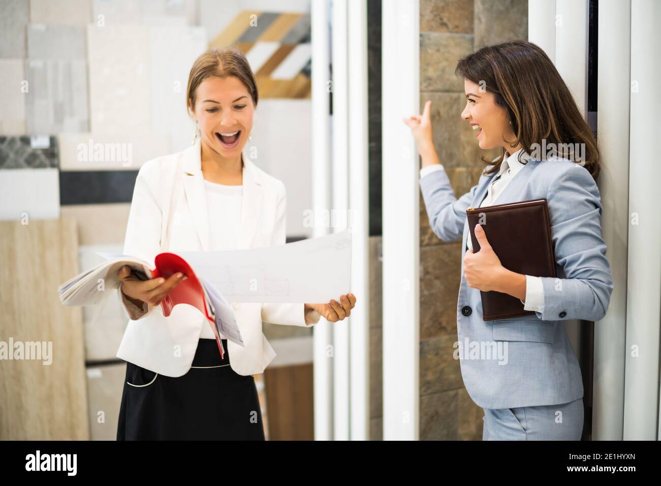 Businesswoman owning small business store. She is talking with a ...