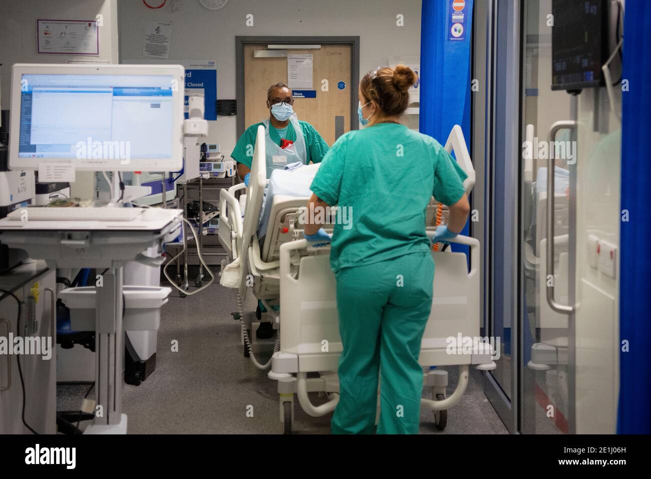 Staff nurses transfer a patient through the Emergency Department at St ...