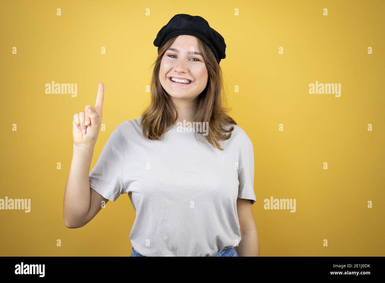 Beautiful young caucasian girl wearing french look with beret over ...